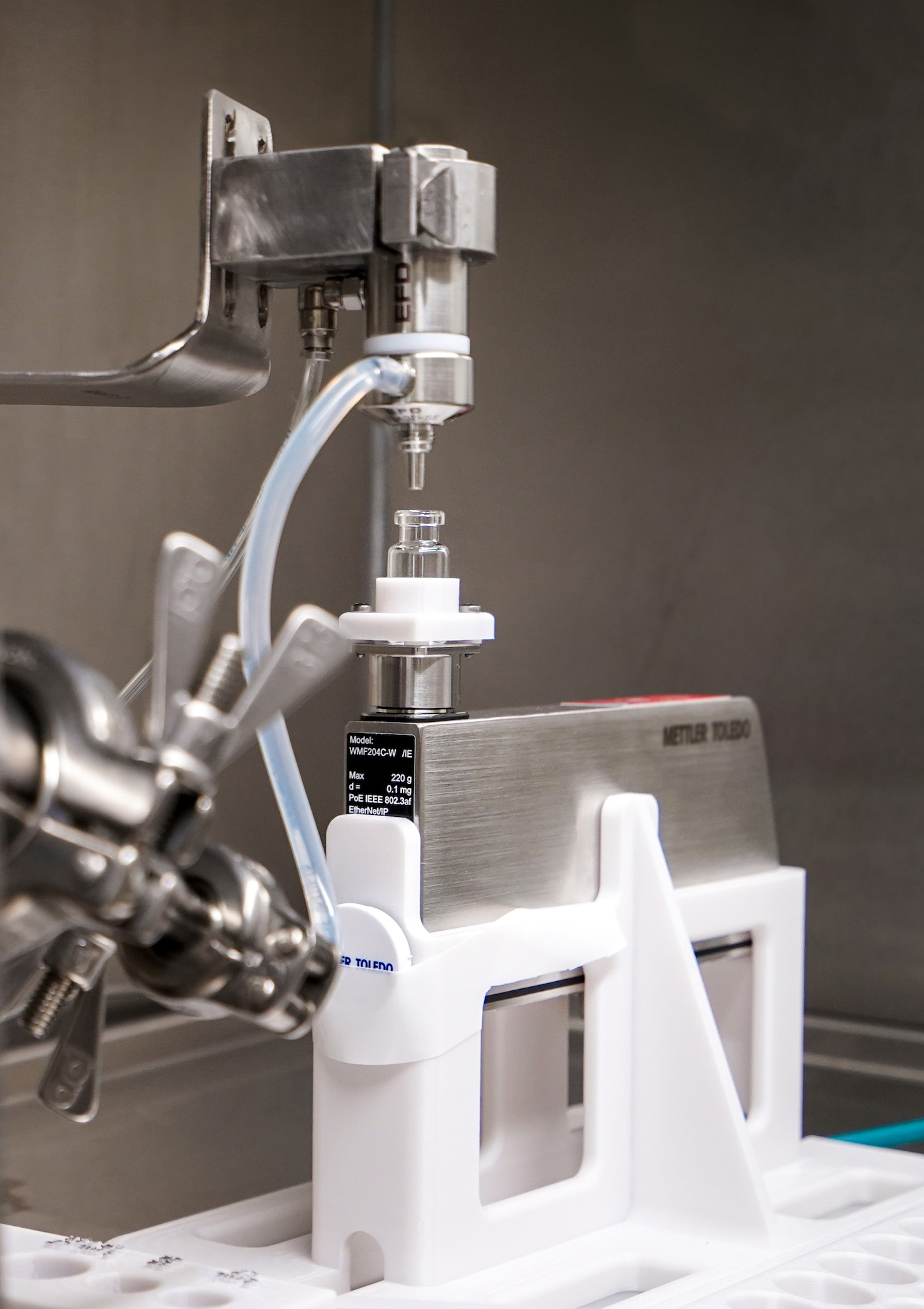Non-destructive weight checks added to low loss fill process